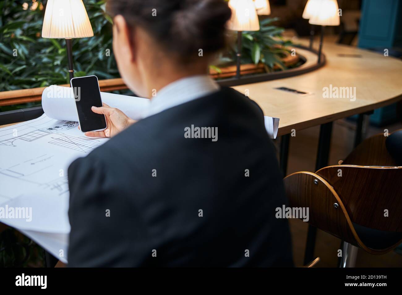 Focused photo on attentive woman that reading message Stock Photo - Alamy