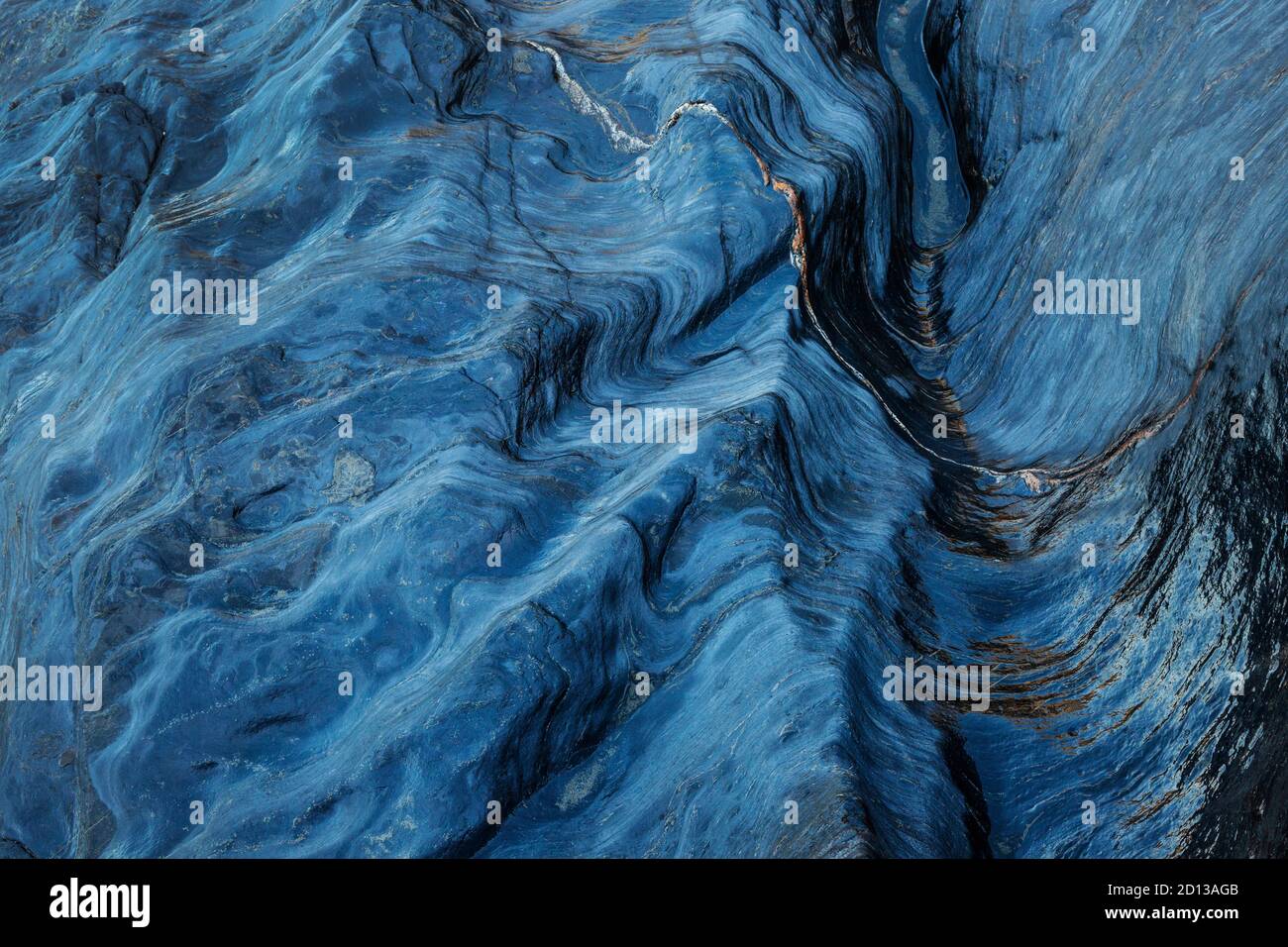 Blue coloured rock in a beach in Cornwall, UK Stock Photo - Alamy