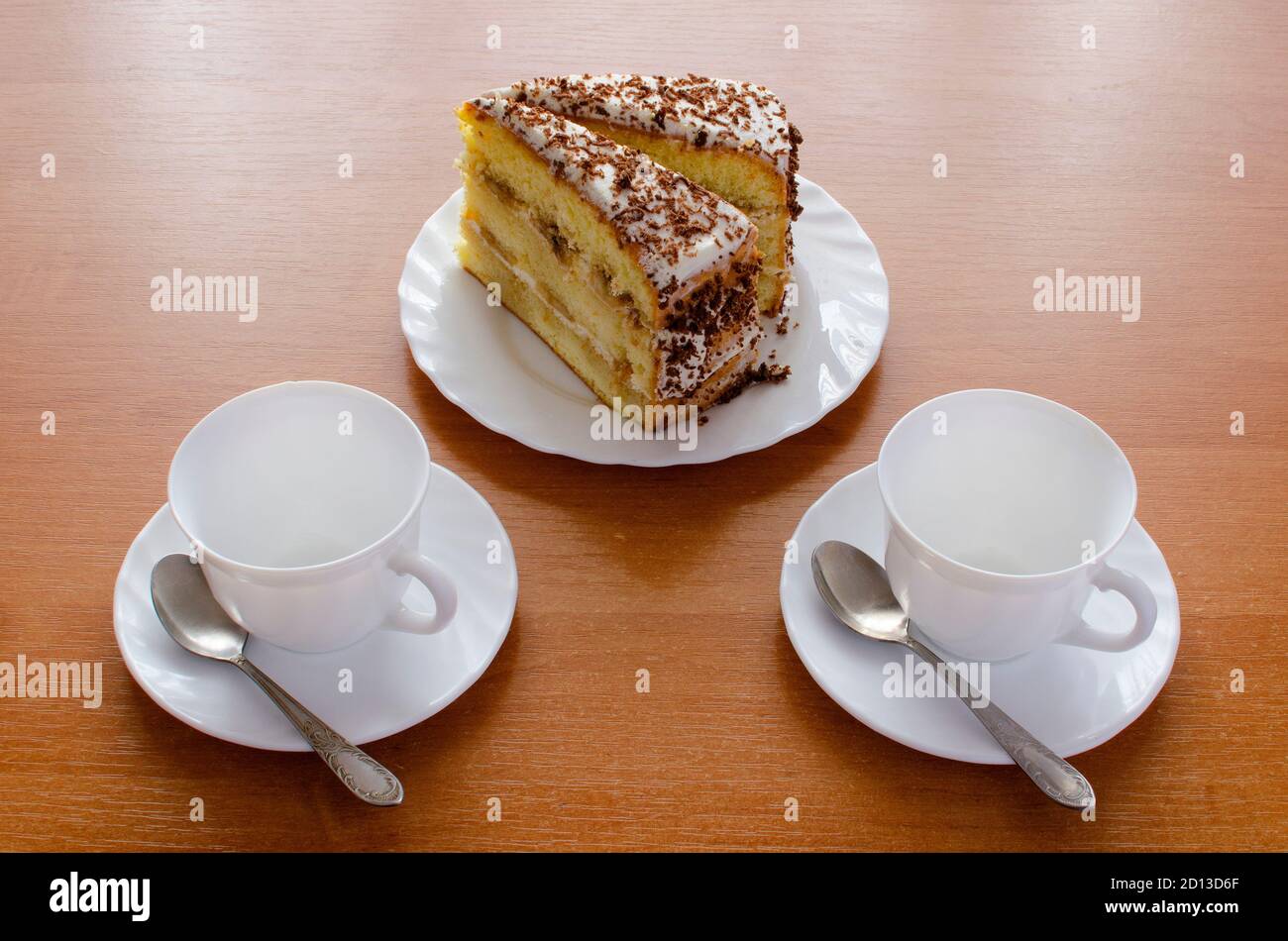 Two cups and pouring tea hi-res stock photography and images - Alamy
