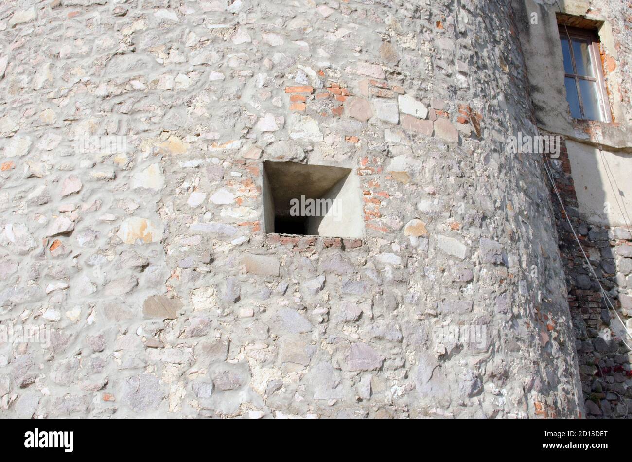 Loophole in the wall of an old mountain fortress architecture hi-res ...