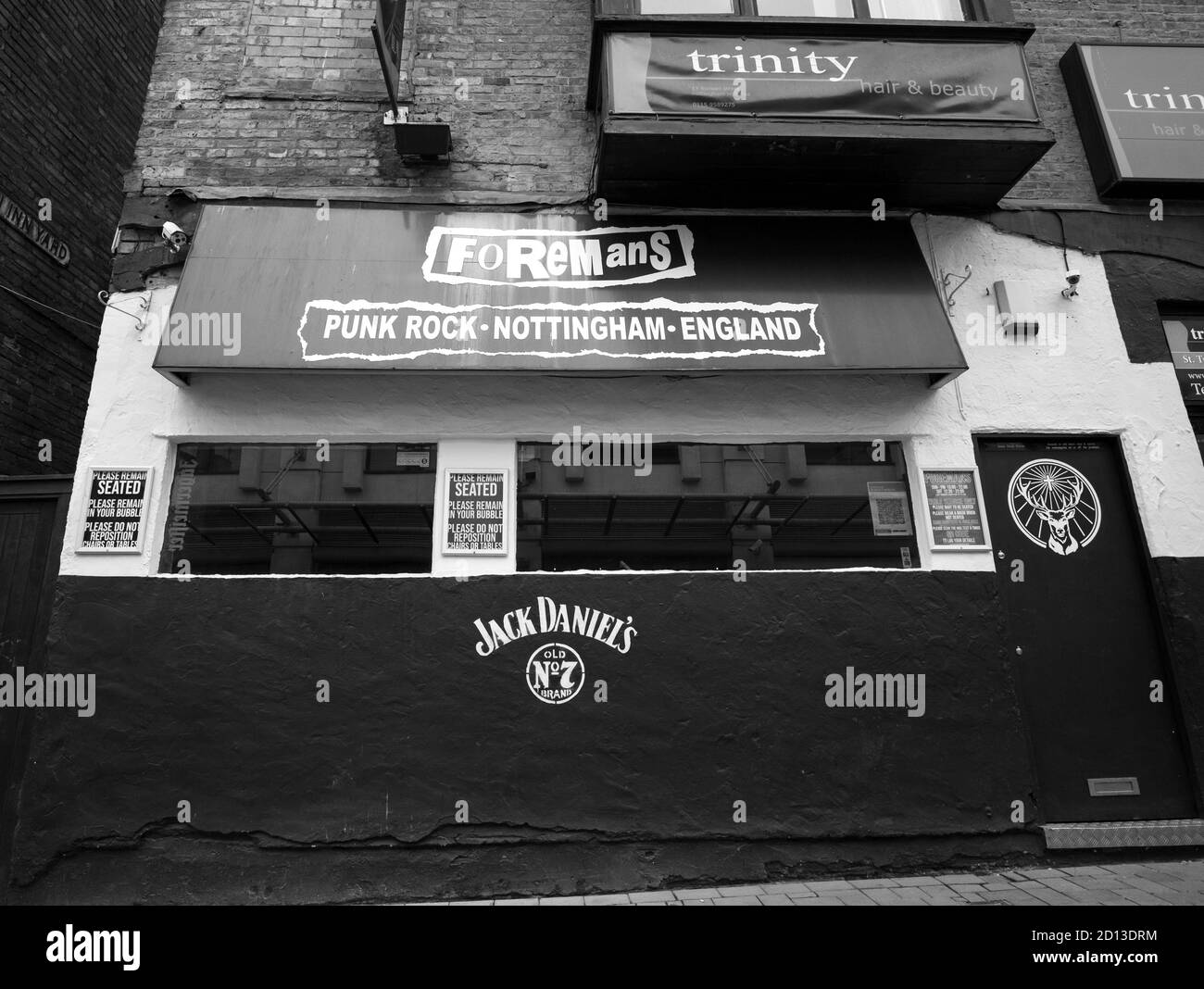 Small city center bar Stock Photo - Alamy