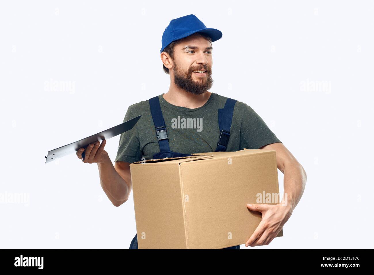 Working male courier with box in hand documents delivery service light ...