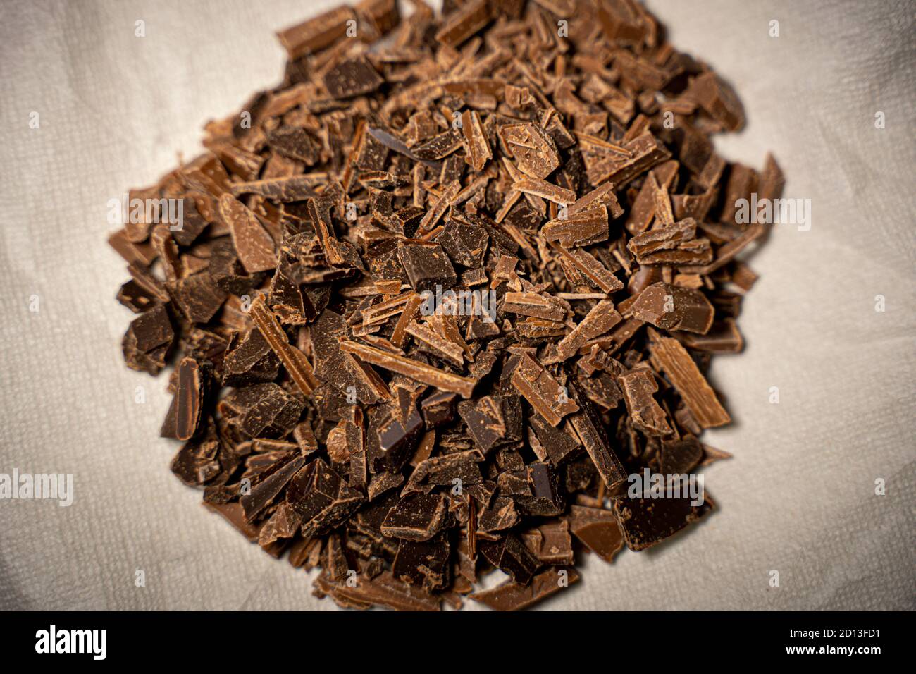 Chopped chocolate on kitchen paper. Close-up Stock Photo - Alamy