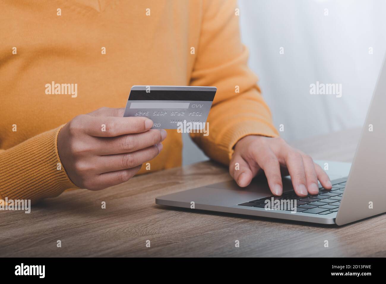 Hand holding credit card with hand for payment online shopping Stock ...