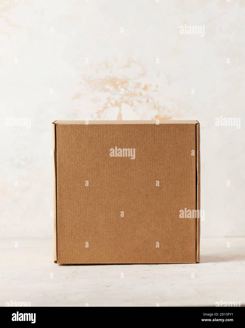 Kraft cardboard square closed box top view on a white background Stock ...