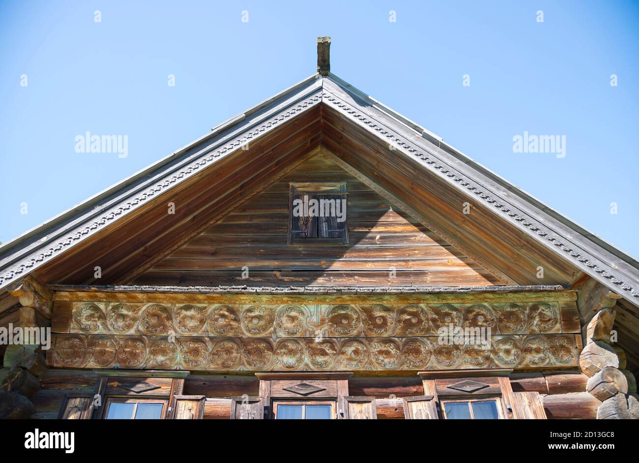 Wooden architecture of Russia. Old rural log house decorated with wood ...