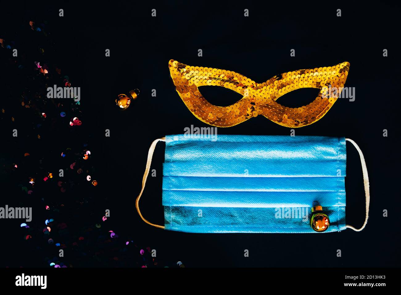Carnival mask and protective medical mask on a blue background. New ...