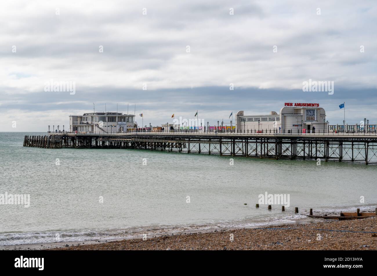 Looking west to Worthing Pier and the pebble beach in West Sussex, UK ...