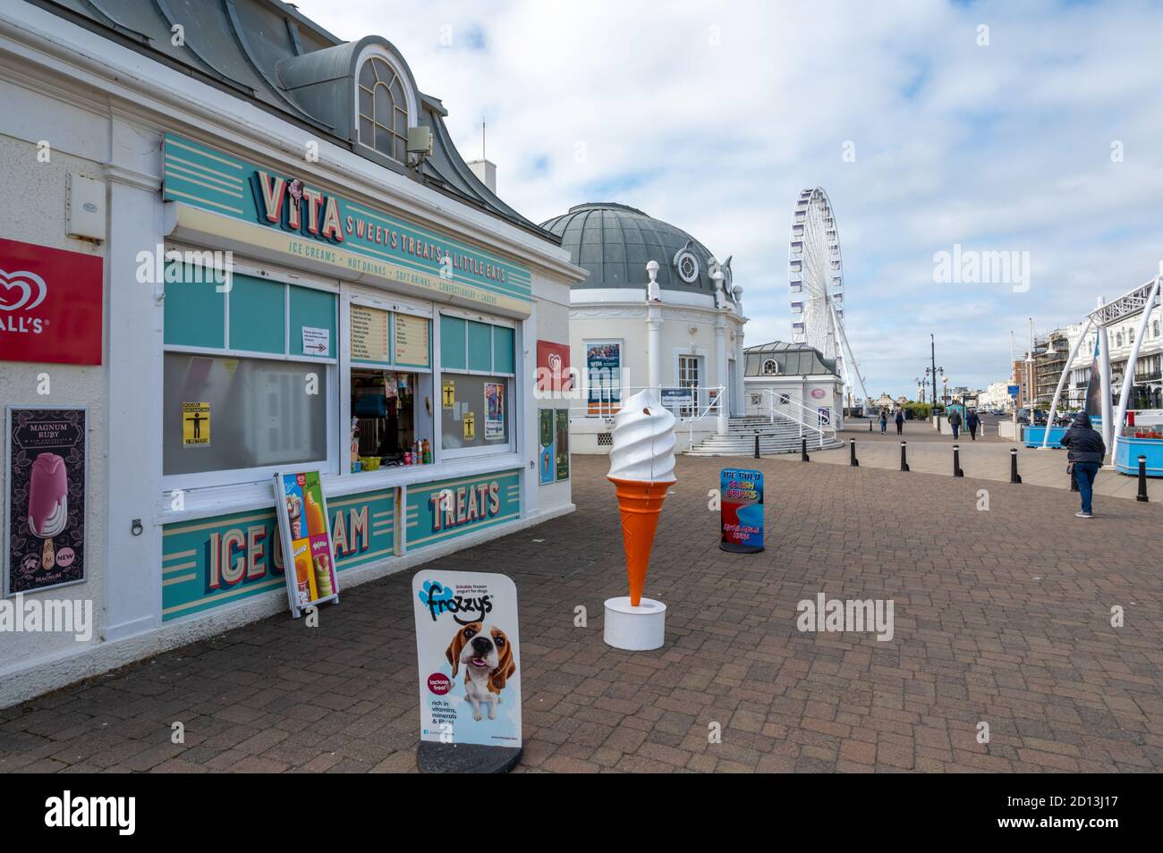 Worthing waterfront by the pier with kiosk selling ice cream and sweets ...