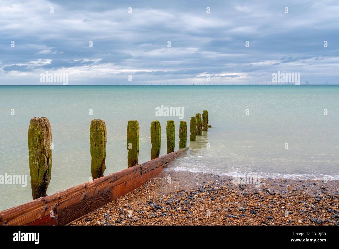 View over the English Channel from Worthing beach with old, wooden ...