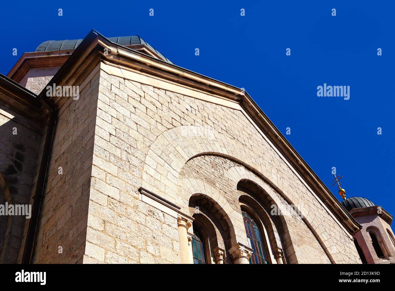 Side view of catholic church with gothic arched windows Stock Photo - Alamy