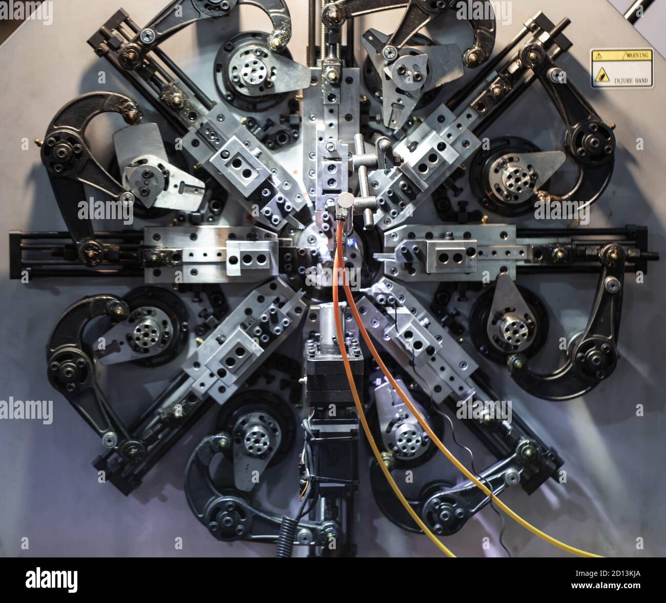 Automatic CNC spring coiling machine. Industrial machinery Stock Photo ...