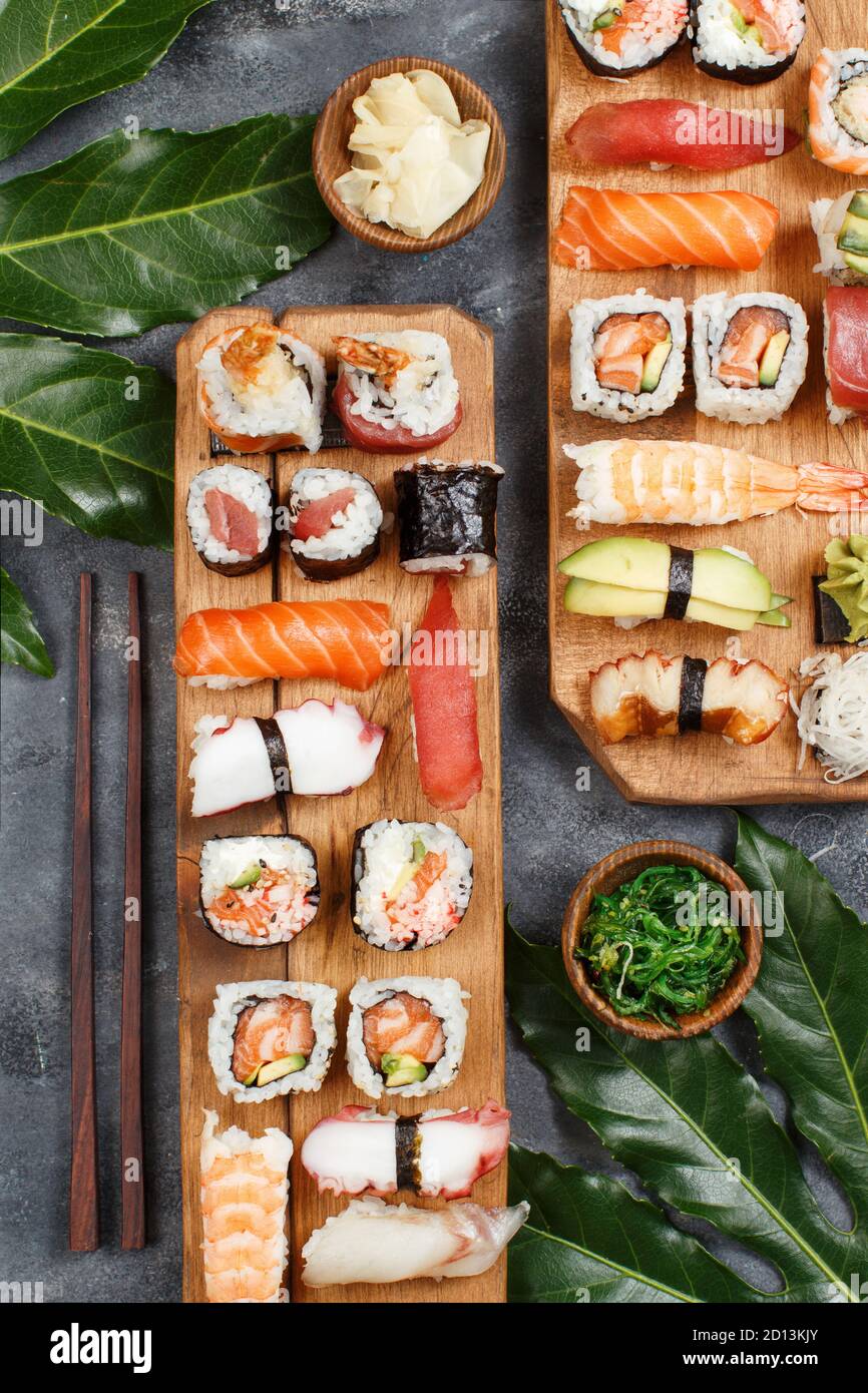 Sushi Set nigiri and sushi rolls on rectangular plates top view Stock ...