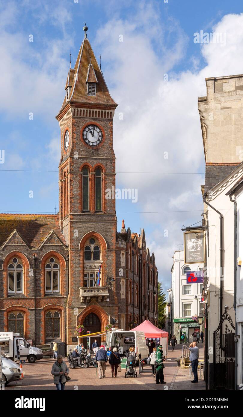 Clock tower of town hall and historic buildings in Market Place ...