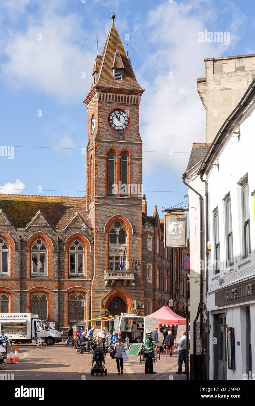 Clock tower of town hall and historic buildings in Market Place ...