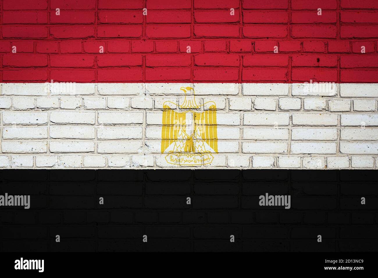 National flag of Egypt depicting in paint colors on an old brick wall ...