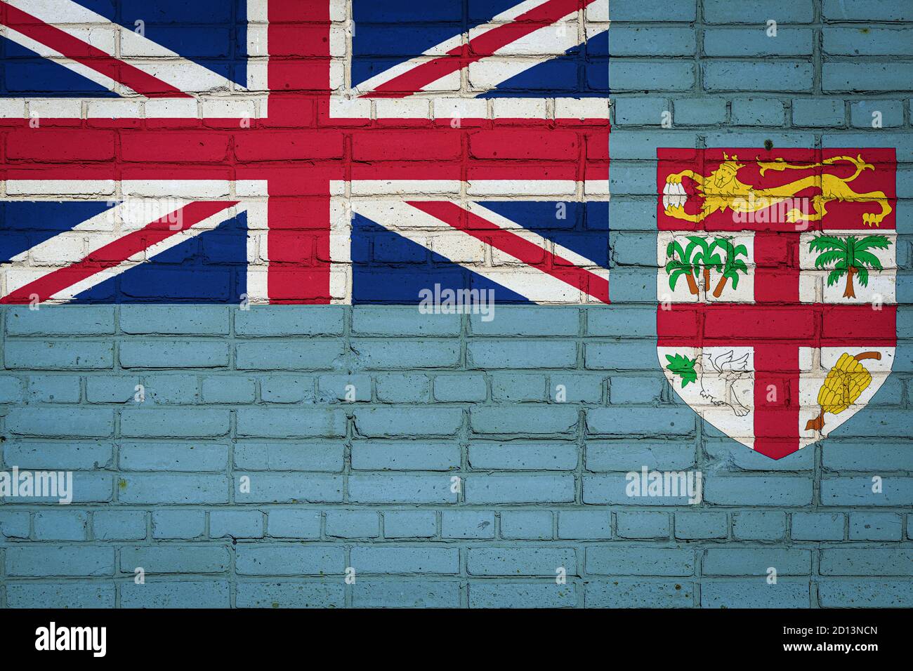 National flag of Fiji depicting in paint colors on an old brick wall ...