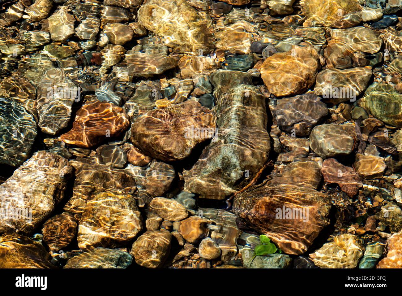 Clear water in the river and stone texture background Stock Photo - Alamy