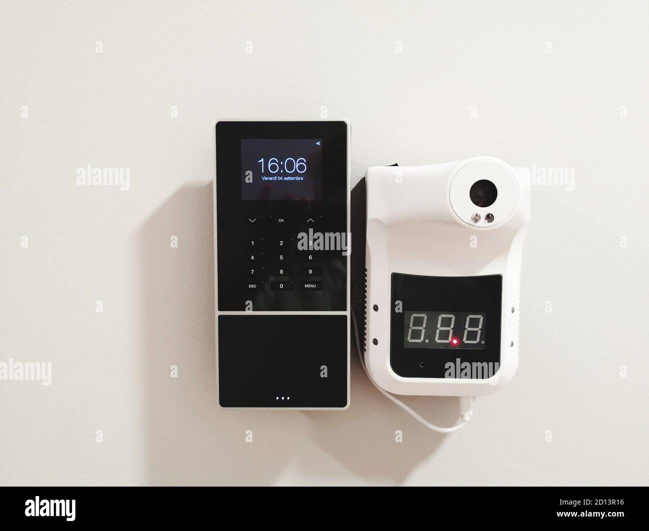 Closeup shot of a temperature detection device and worker access ...