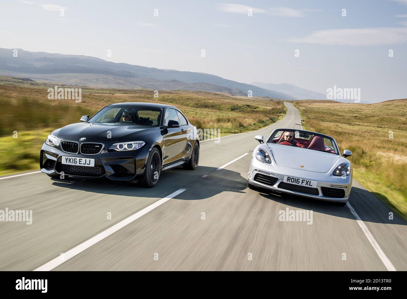 BMW M2, Porsche Boxster S during the road test of the year Stock Photo ...