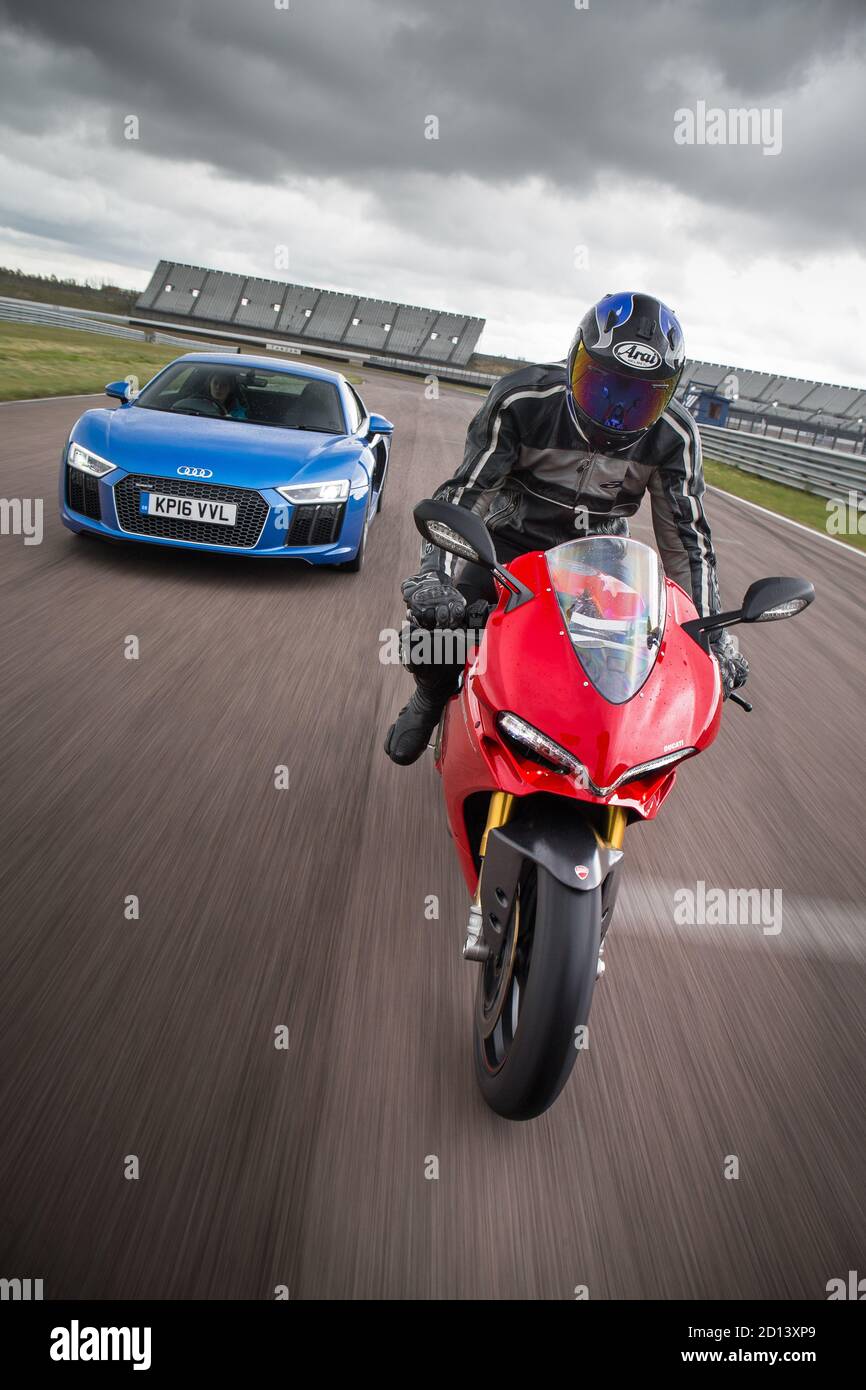 Audi R8 Races Motorcycles