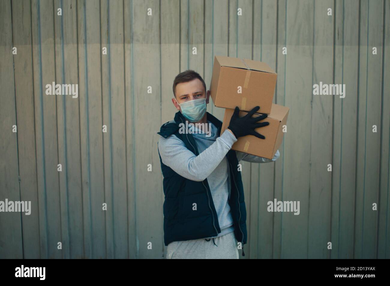 Man carry box on shoulder hi-res stock photography and images - Alamy
