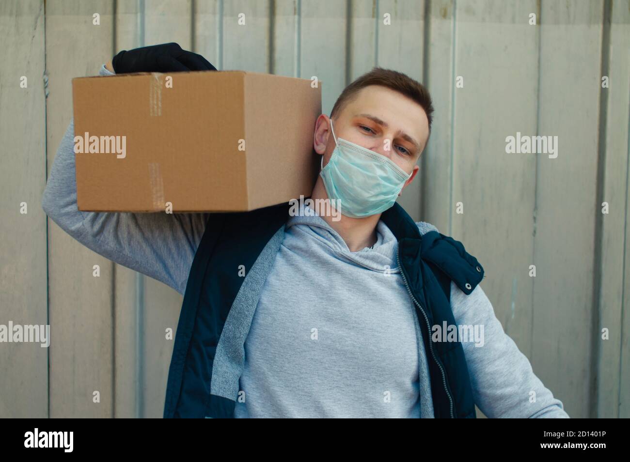 Man carry box on shoulder hi-res stock photography and images - Alamy