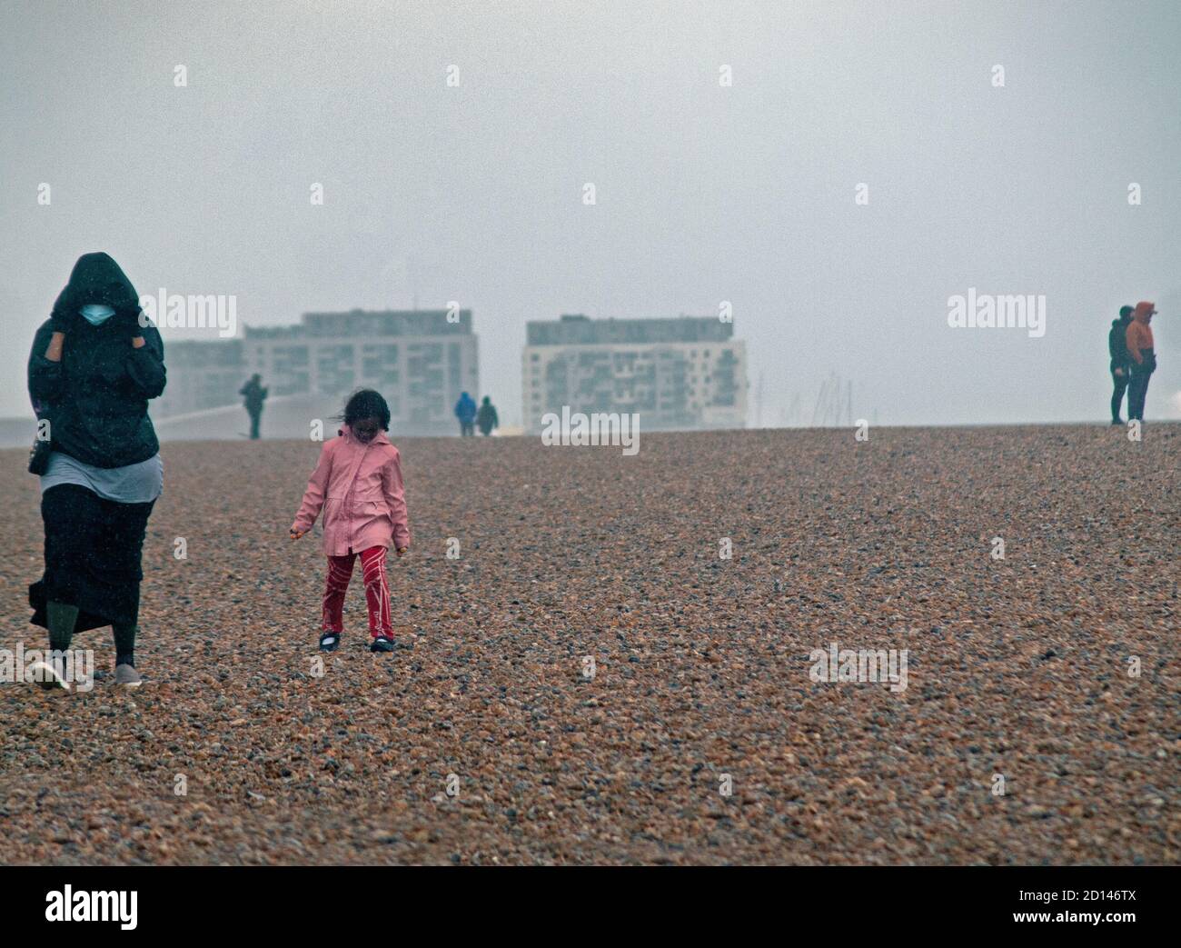 A wet day on the beach at Brighton Stock Photo - Alamy