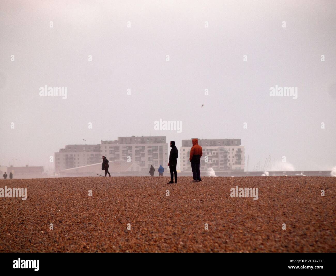 A wet day on the beach at Brighton Stock Photo - Alamy