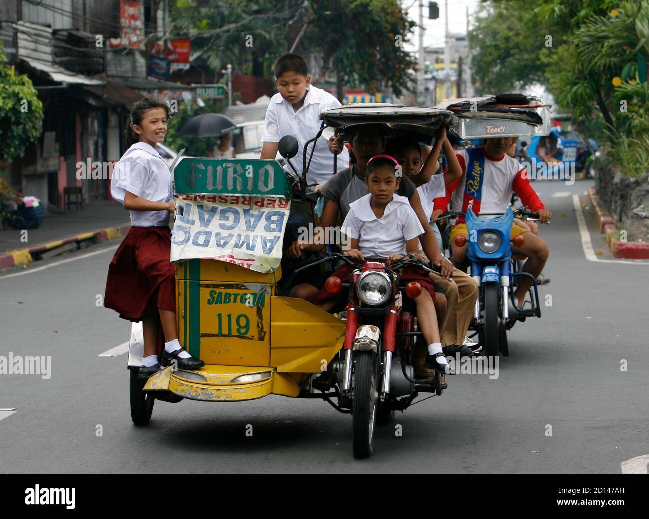 Tricycle philippines children hi-res stock photography and images - Alamy