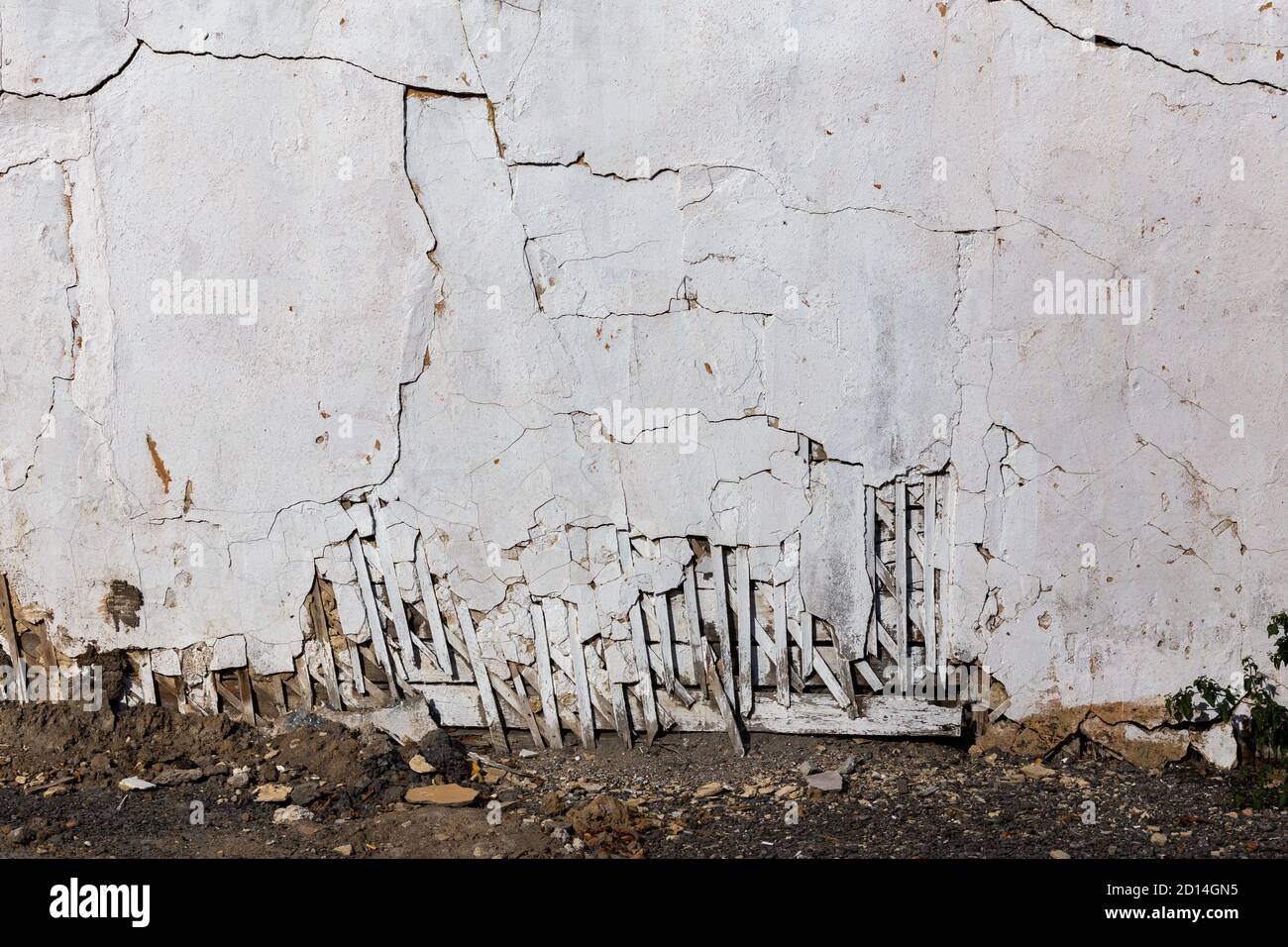 poor wattle and daub cracked stucco wall with white plaster Stock Photo ...