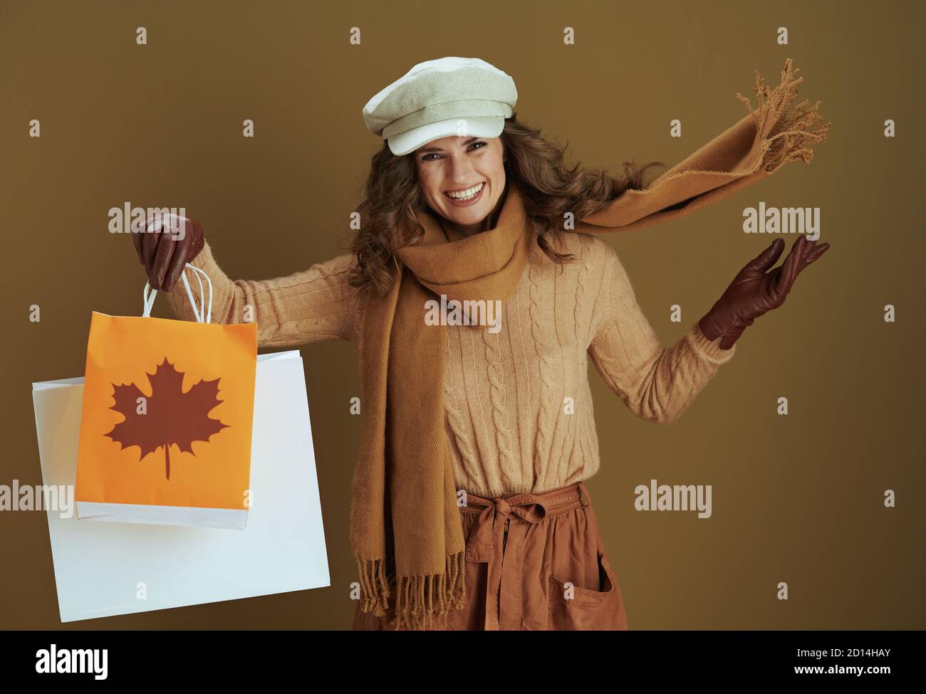Hello october. happy elegant 40 years old woman in scarf with leather ...