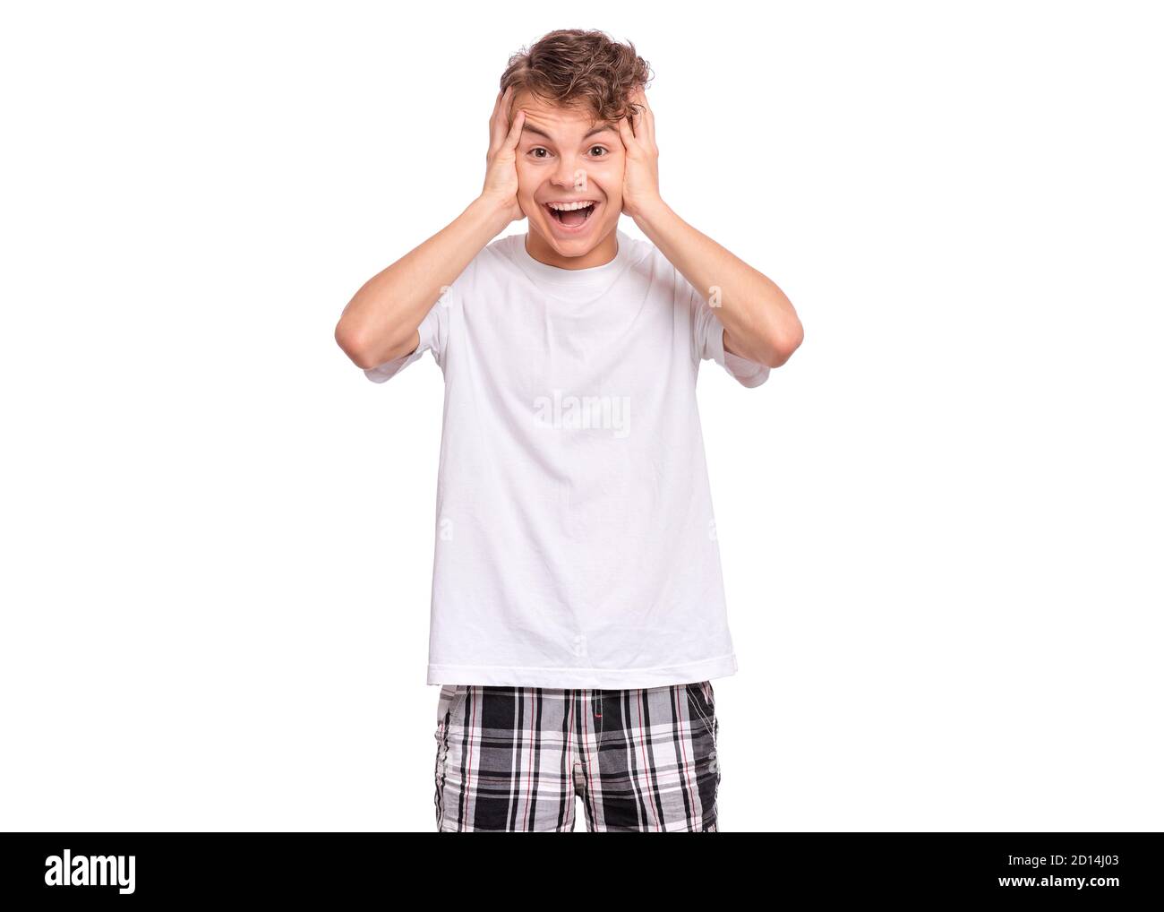 Handsome teen boy laughing looking very happy Stock Photo - Alamy