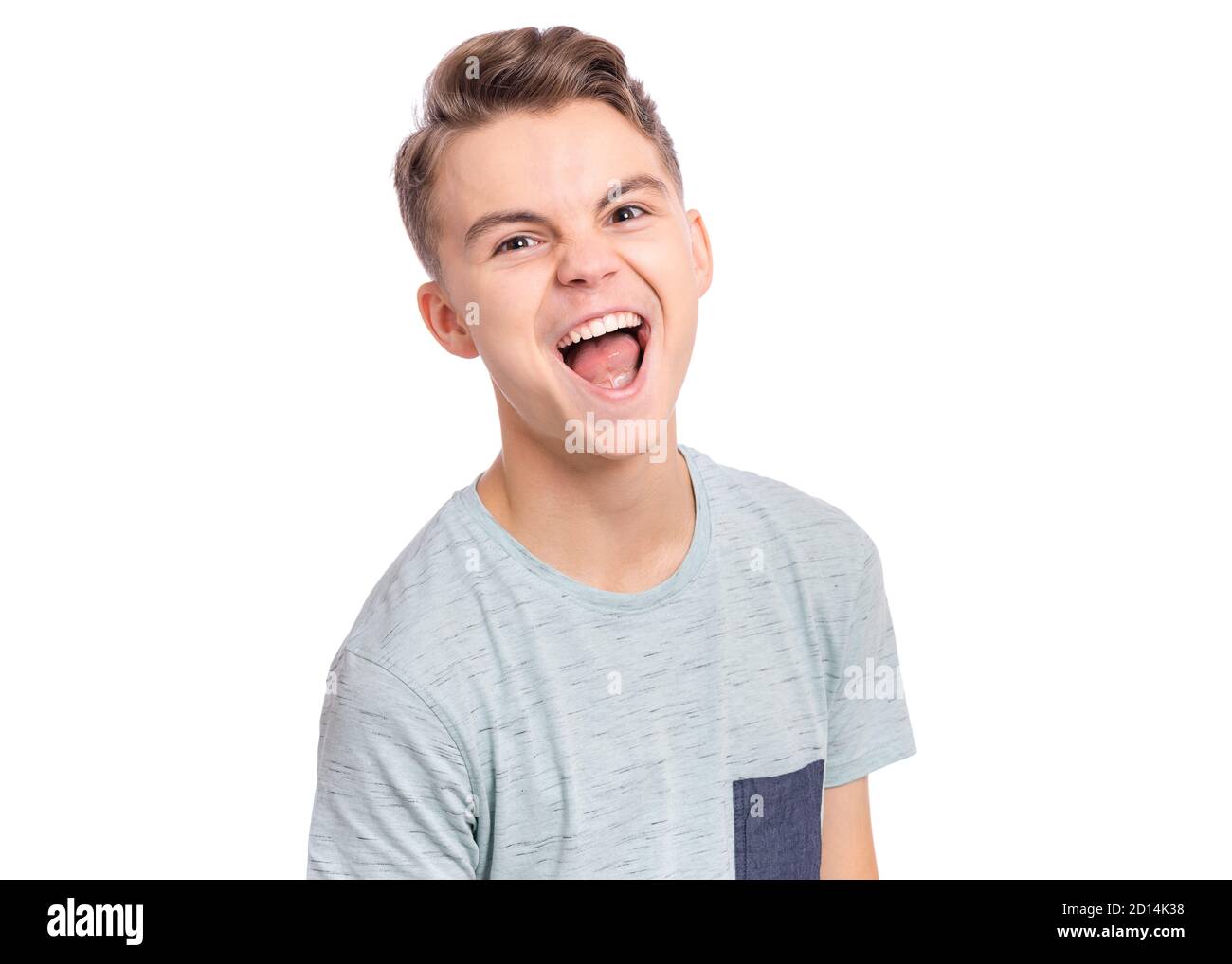 Handsome teen boy laughing looking very happy Stock Photo - Alamy