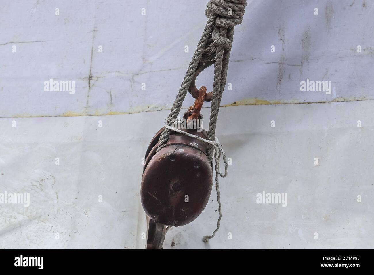 Closeup of old rope pulley of a ship Stock Photo - Alamy