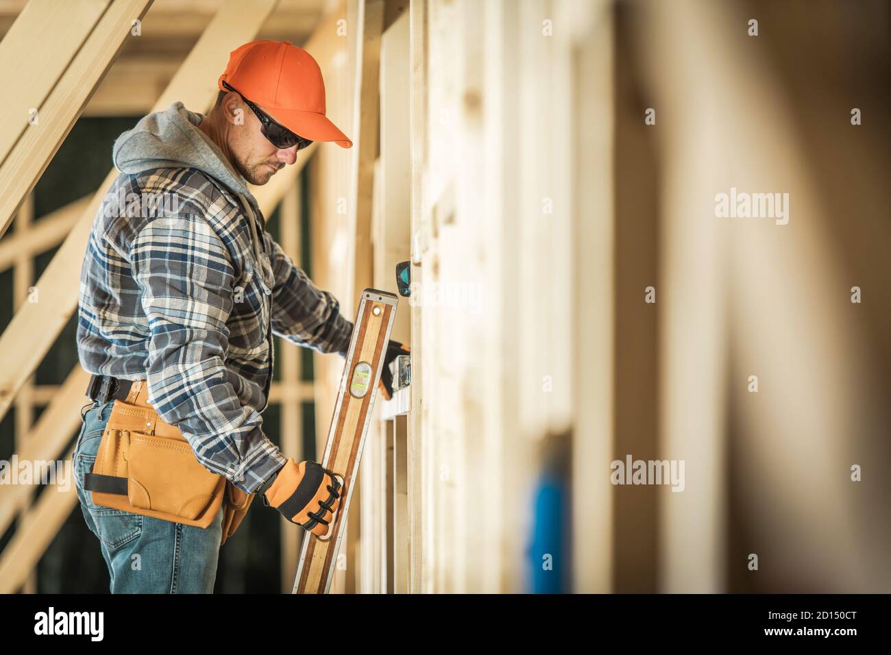 Caucasian Construction Contractor Worker in His 40s with Spirit Level ...