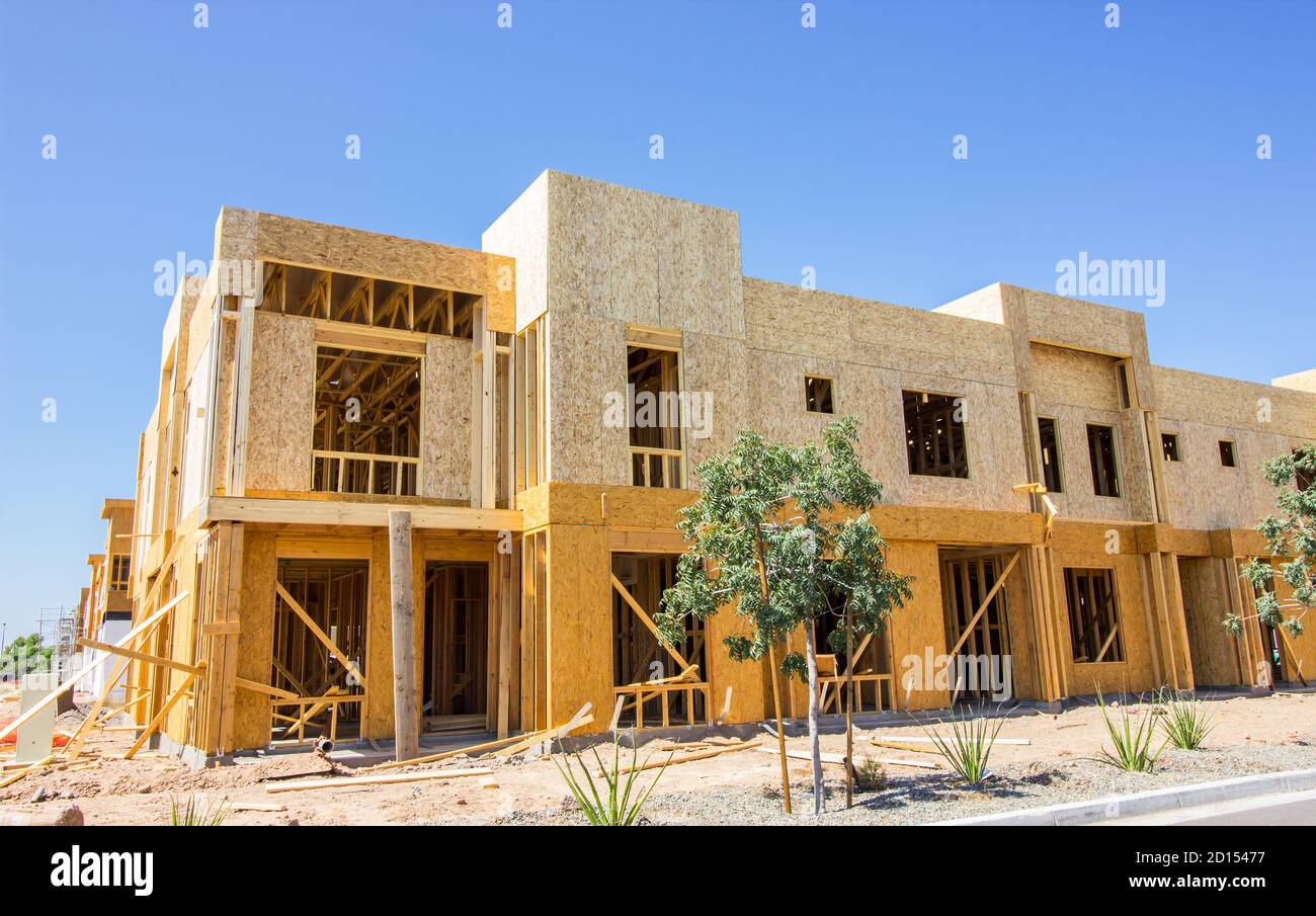 New Two Story Apartment Building Under Construction Stock Photo - Alamy