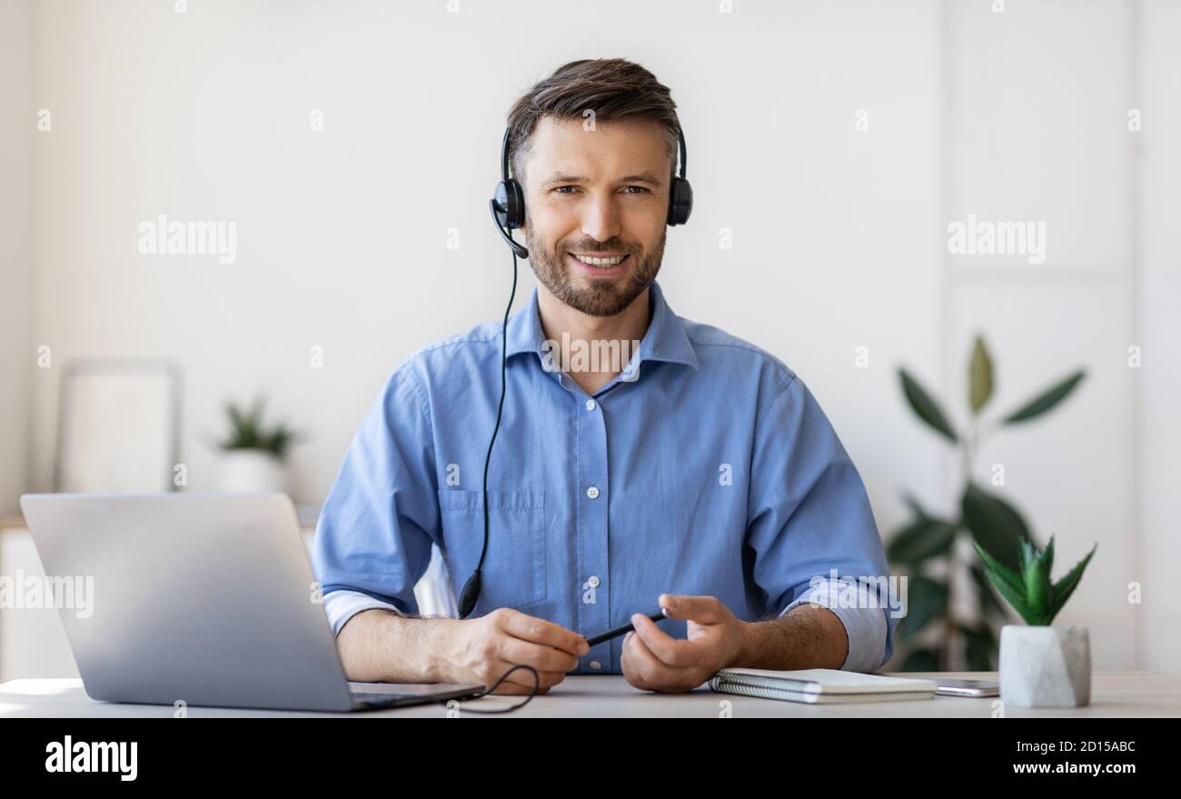 Portrait male customer service representative hi-res stock photography ...
