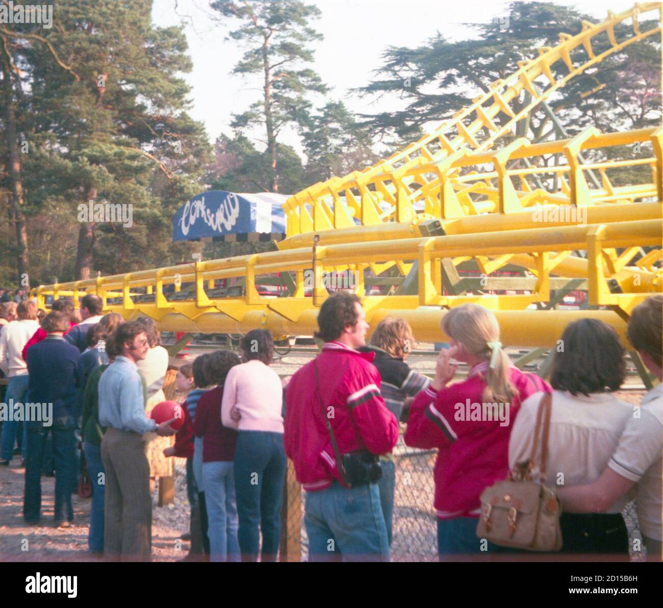 Vintage photo of people queing to go on the newly opened Corkscrew ride ...