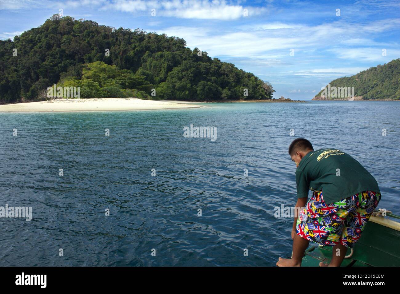 Boat approaches uninhabited island, Mergui Archipelago, Andaman Sea ...