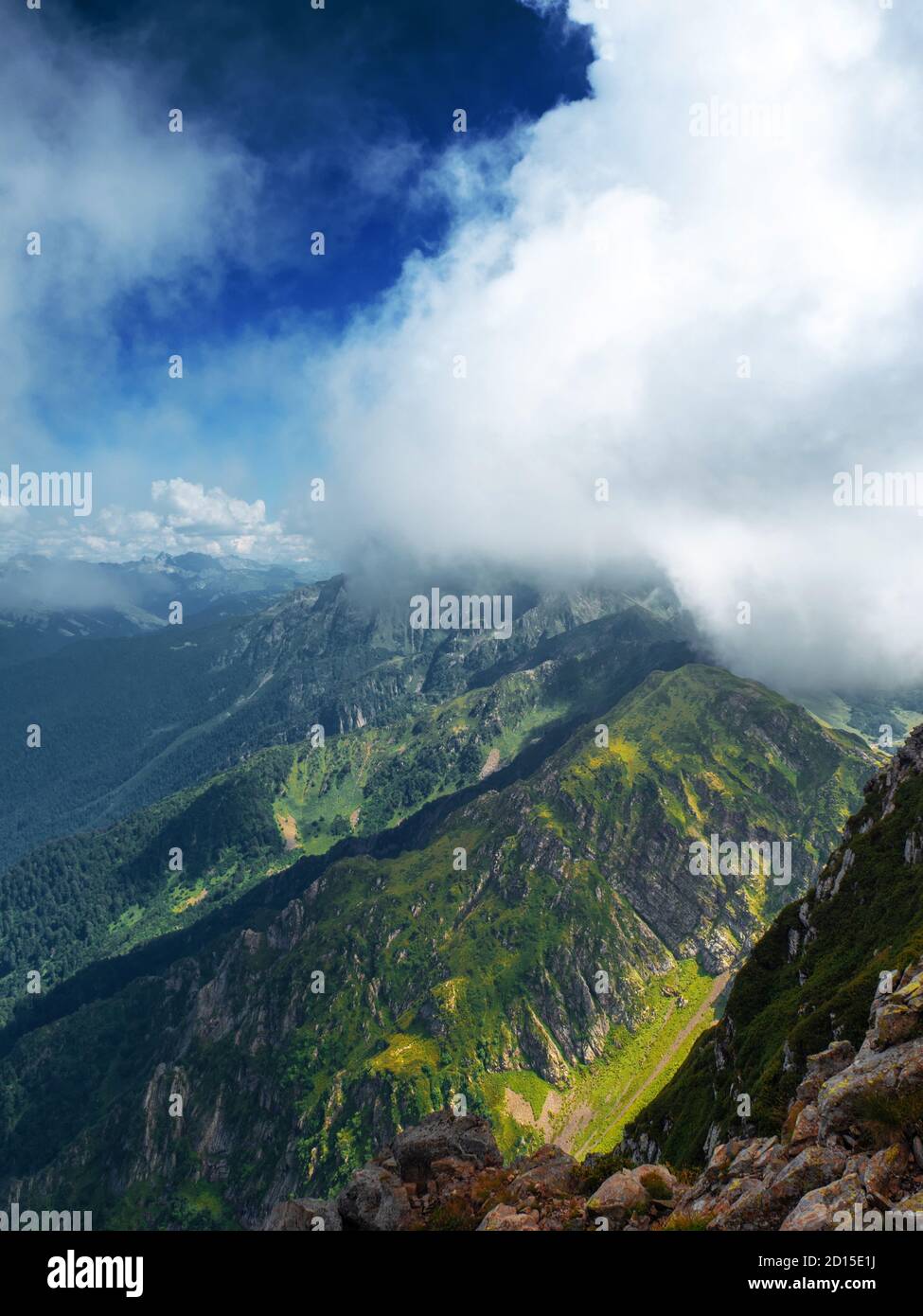 Beautiful mountain landscape. High-mountain massif, clouds over ...