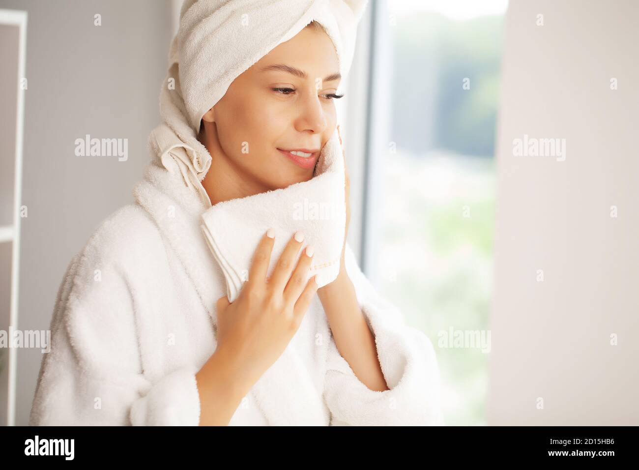 Face with washcloth washing hi-res stock photography and images - Alamy