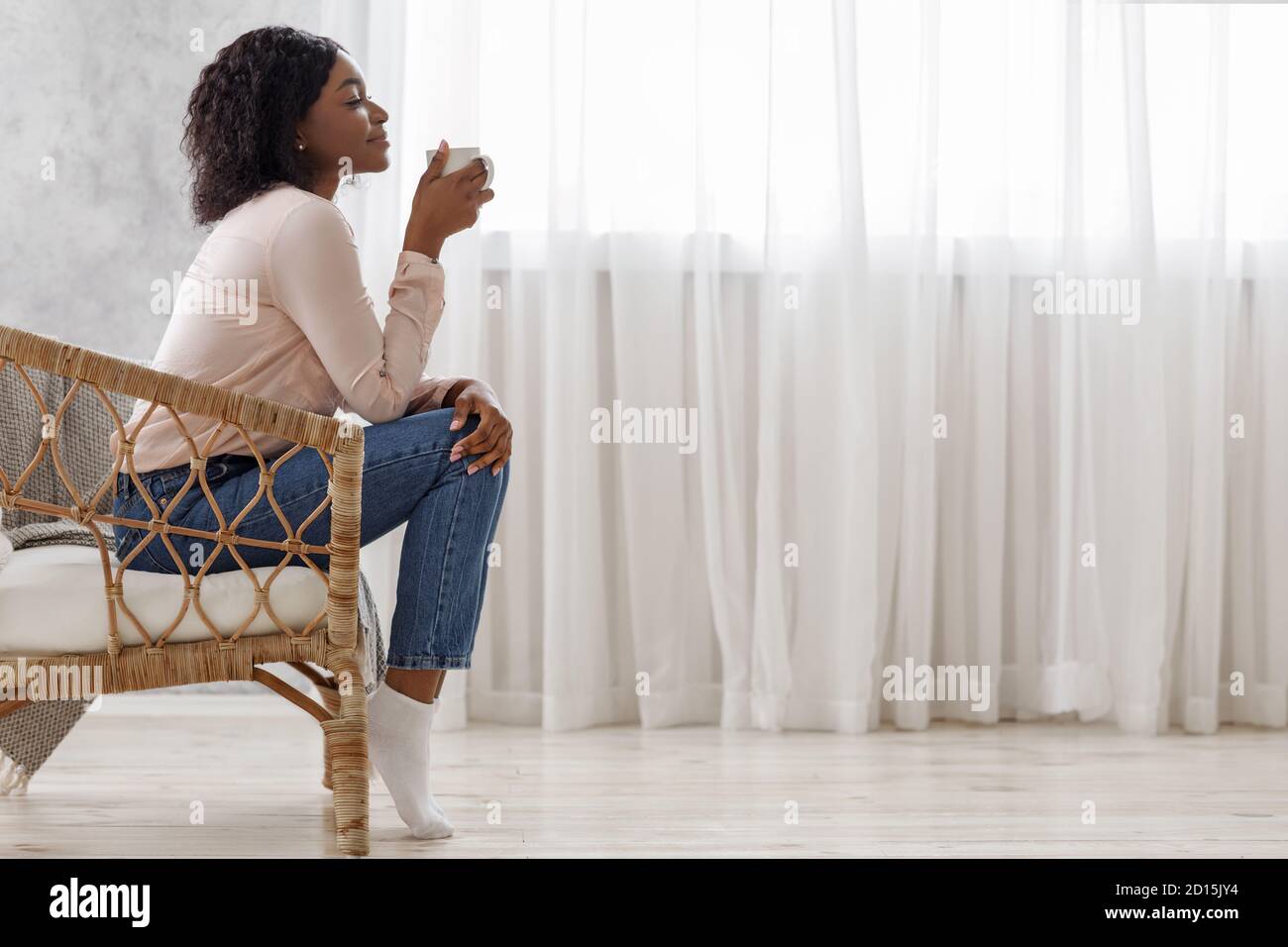 Relaxing Morning. Side View Of Black Female Sitting On Chair Enjoying ...