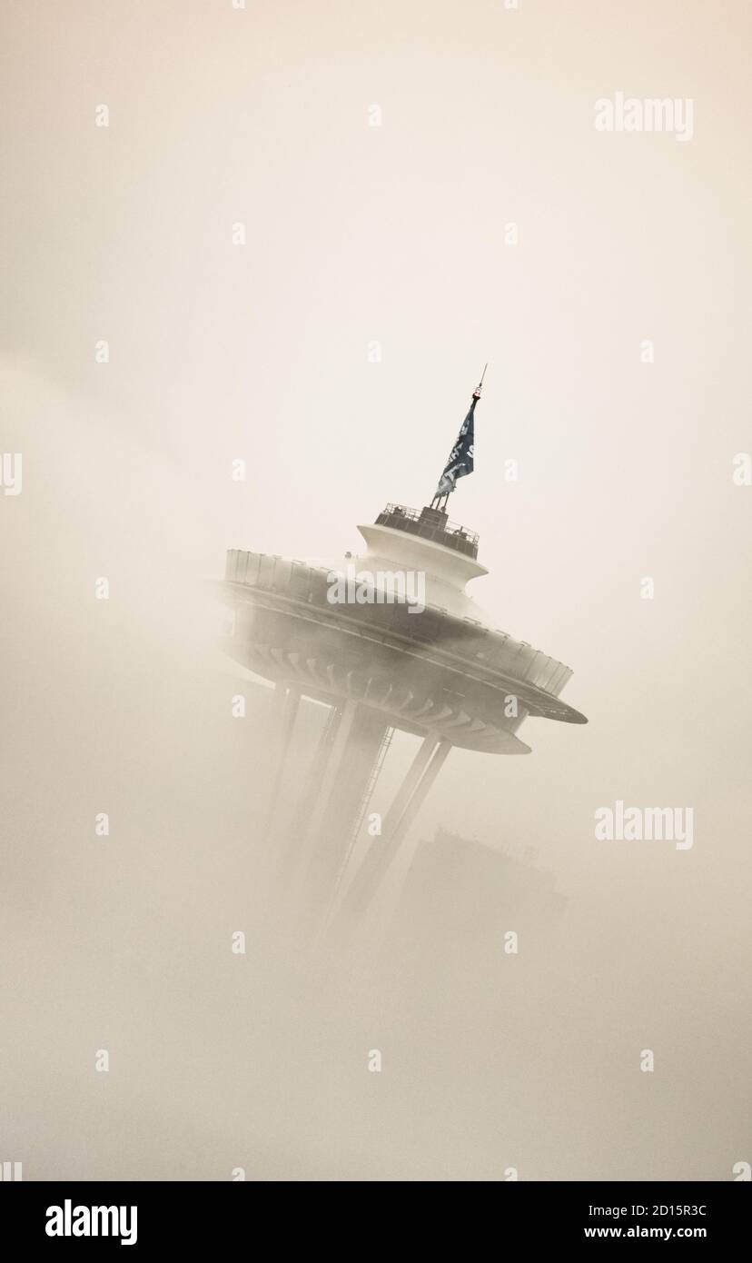 The Iconic Space Needle in Seattle, Washington, enshourded by fog and ...