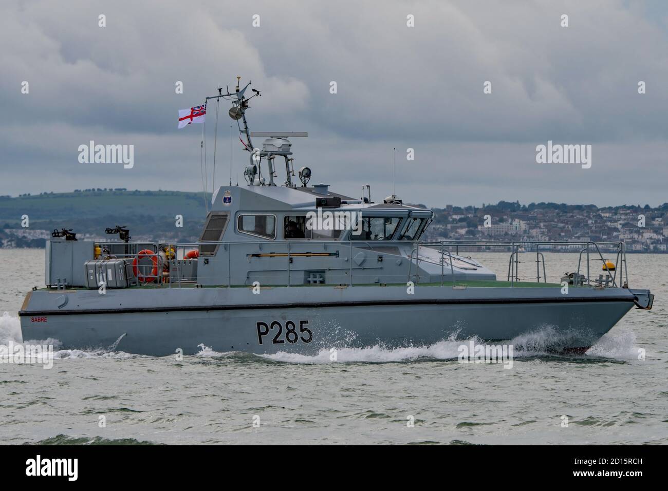 The Royal Navy fast patrol boat HMS Sabre (P285) arriving at Portsmouth ...