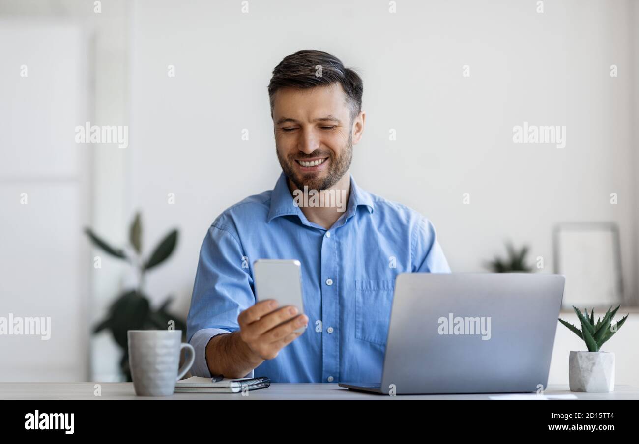 Male office manager using hi-res stock photography and images - Alamy