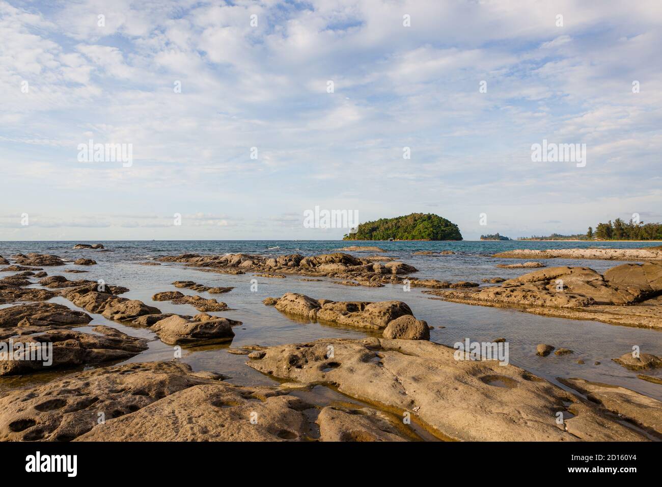 Smooth long rocks beach borneo malaysia Stock Photo - Alamy