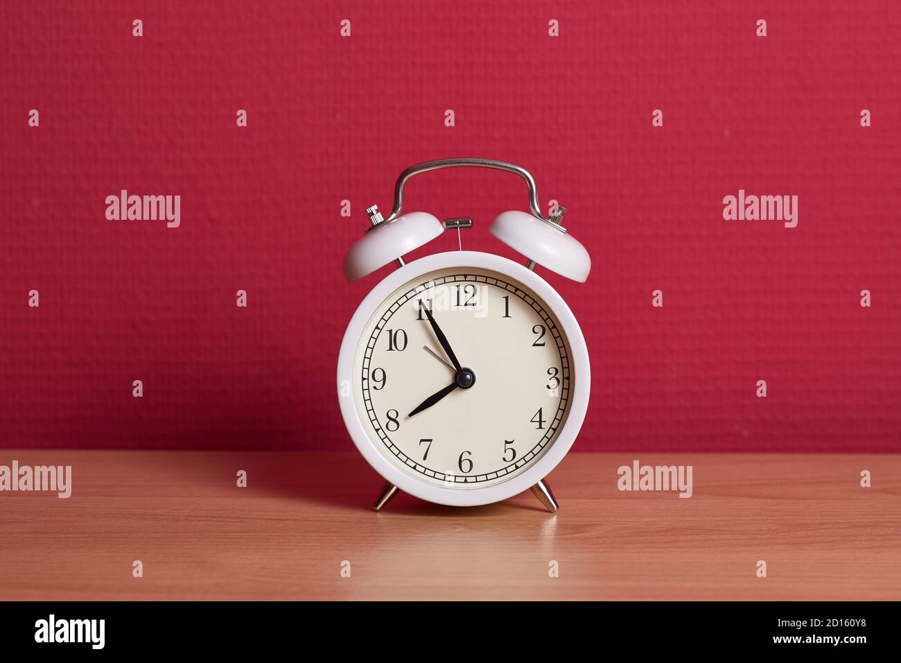 Alarm Clock on a Shelf Stock Photo - Alamy