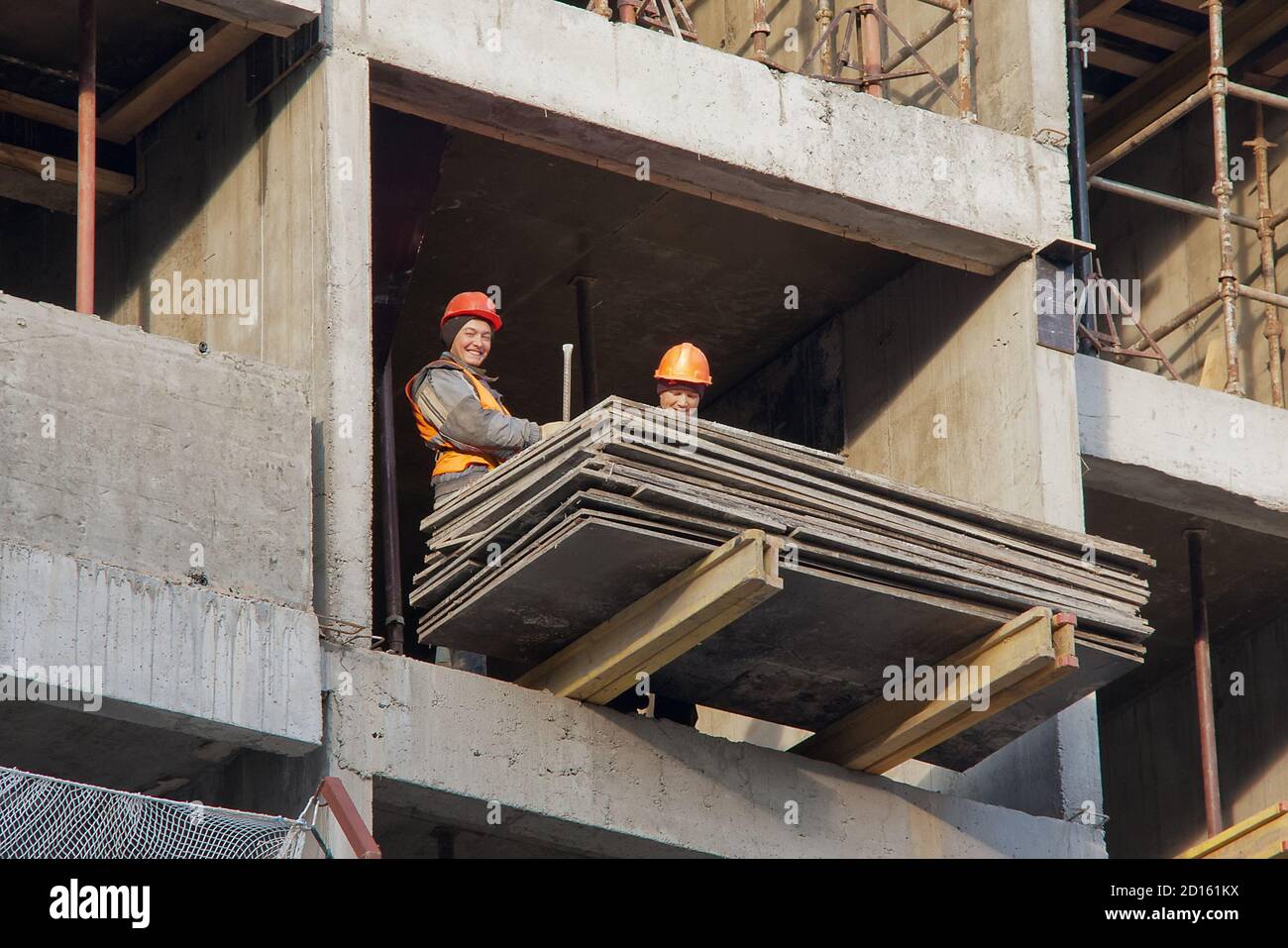 Russia. Moscow. Workers on the construction of a multi-storey ...