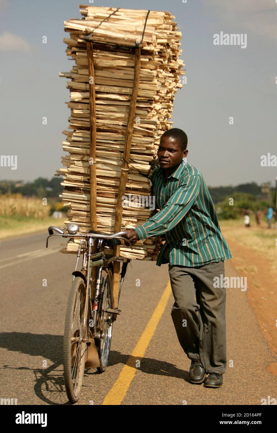 Overloaded bicycle africa hi-res stock photography and images - Alamy